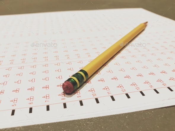 Scantron and pencil. Stock Photo by wdnesday | PhotoDune