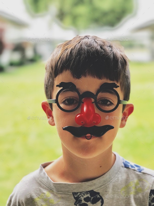 Boy wearing disguise. Stock Photo by wdnesday | PhotoDune