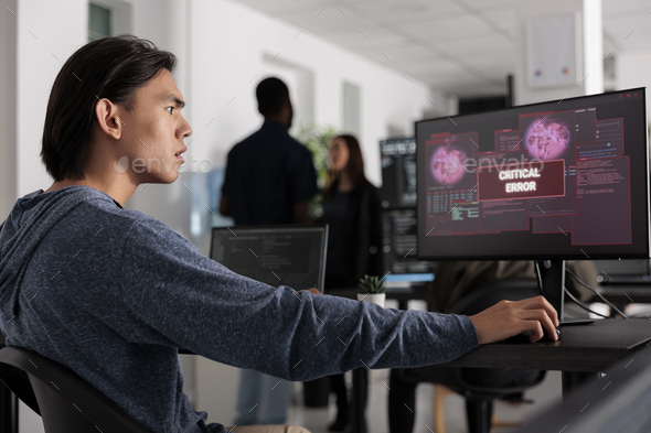 Worried software developer having web server hacked Stock Photo by DC_Studio