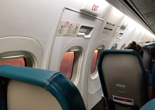 On an Airplane! Emergency Exit Door! Stock Photo by AZ-BLT | PhotoDune
