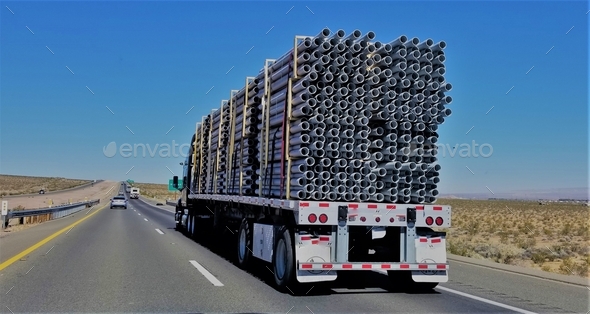 Trucking! Pipes on a Flatbed! NOMINATED!! Stock Photo by AZ-BLT | PhotoDune