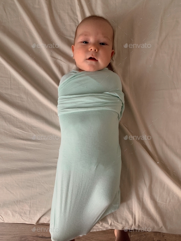 baby wrapped in a diaper Stock Photo by dryaminamarina | PhotoDune