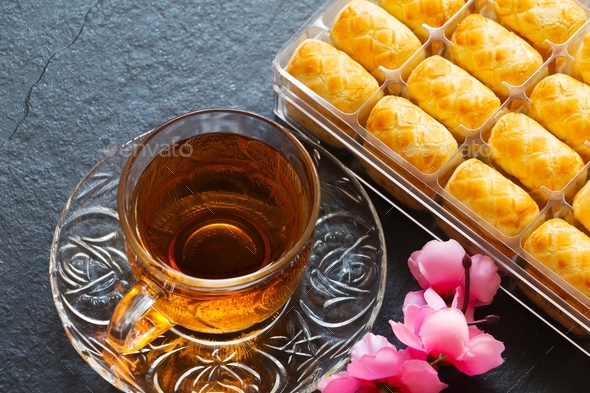 Cup of Chinese tea served with Pineapple jam tart Stock Photo by ...