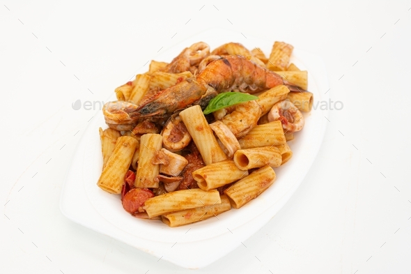 Rigatoni with seafood. Pasta marinara. Prawns. Tomato sauce. Italian ...