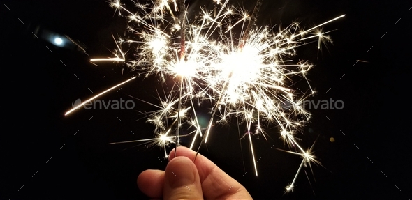 Sparklers! Celebrating with Sparkling Sparklers! Person Holding ...