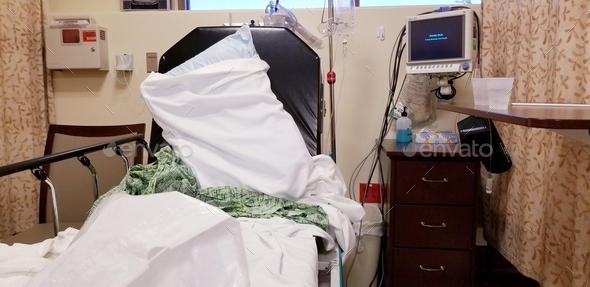 Patient Hospital Gown and Empty Hospital Bed! Patient Discharged! Stock ...