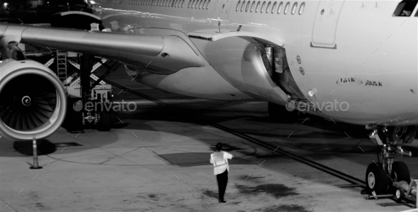 At the Airport! Pilot Walks Around the Plane and Inspects Before Take ...