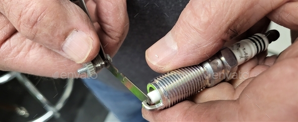 Garage Mechanics! Auto Mechanic Gapping Spark Plugs! Gapping Spark ...
