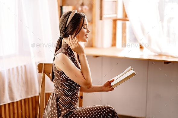 beautiful girl reading a book Stock Photo by elmizaismagilova | PhotoDune
