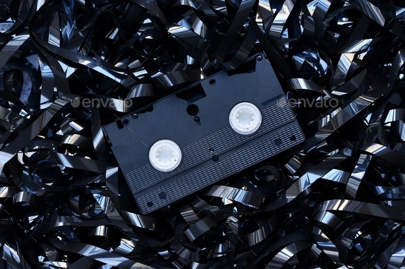 VHS tape in a tangled tape Stock Photo by nodar77 | PhotoDune