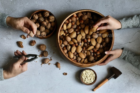 People eating nuts Stock Photo by nodar77 | PhotoDune