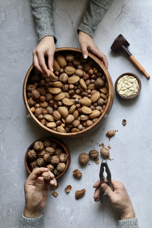 People eating nuts Stock Photo by nodar77 | PhotoDune