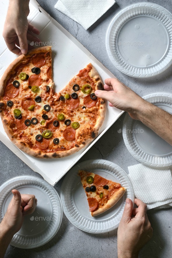 People eating pizza Stock Photo by nodar77 | PhotoDune
