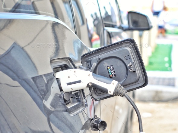 Electric car fill up recharge Stock Photo by spencerpa440 | PhotoDune