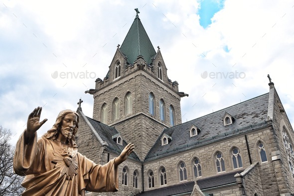 Stone church European Architecture with Sacred Heart of Jesus welcoming ...