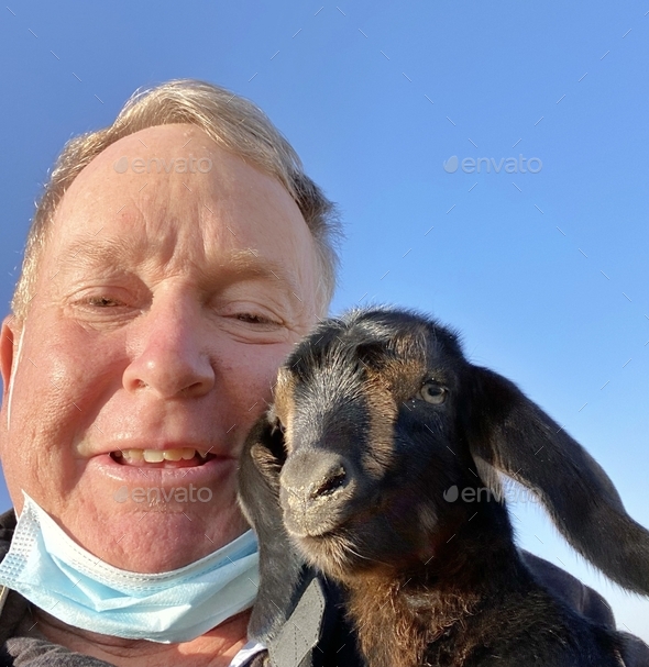 Just a couple of kids! Smiling, childlike redheaded baby boomer man ...