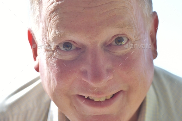 Closeup headshot candid portrait of a smiling happy baby boomer Stock ...