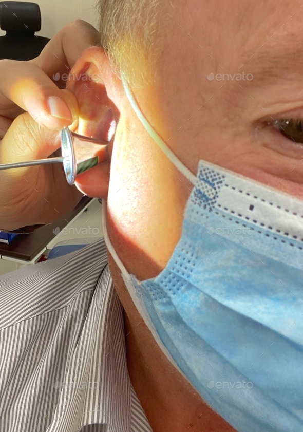Middle aged baby boomer male wears a ppe face mask at the Eat Nose and ...