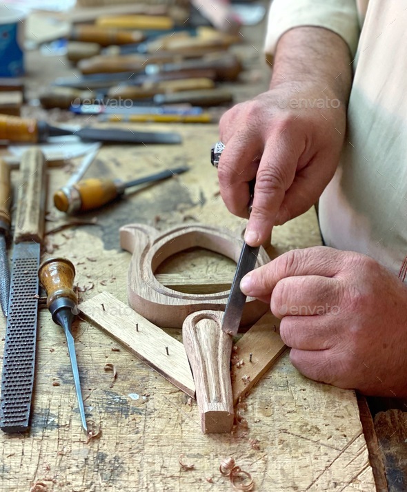 Master woodworker craftsman at work in his shop with his tools Stock ...