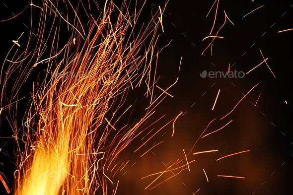Fire sparks during night time. Long exposure Stock Photo by andreealive