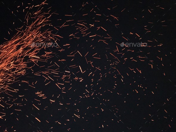 Fire sparks flying in the nighttime Stock Photo by andreealive | PhotoDune