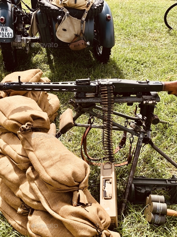 Antique machine gun used during World War Two with sandbags. Stock ...