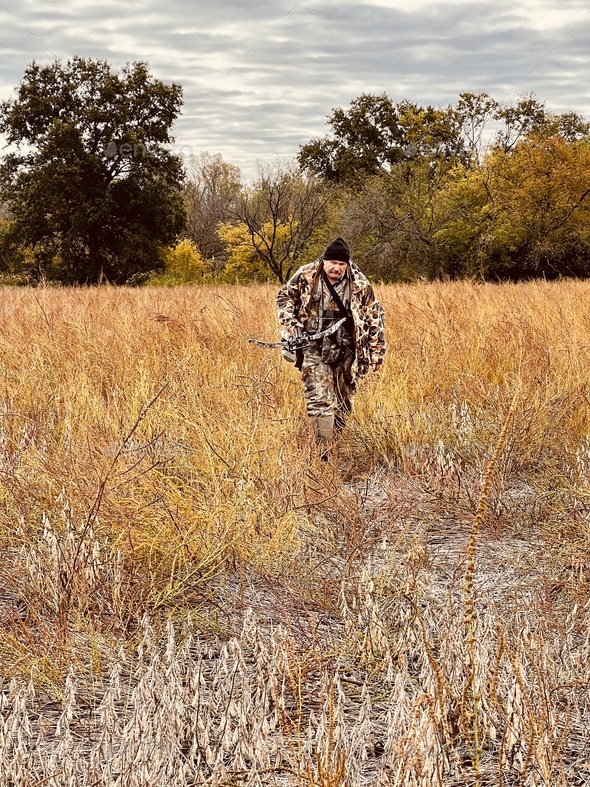 Hunter in the field. Stock Photo by marisap7 | PhotoDune