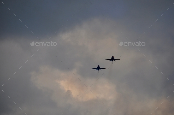 Two military planes flying overhead. Stock Photo by marisap7 | PhotoDune