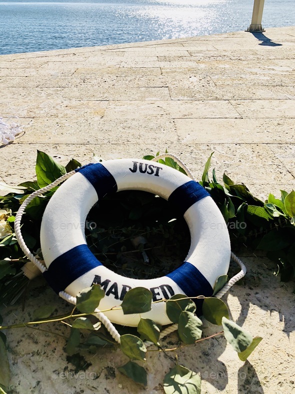 A life saver used as a wedding decor with the words, just married ...