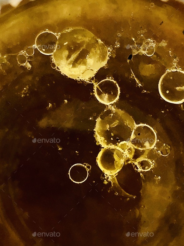 Mixing oil and water together. Stock Photo by marisap7 | PhotoDune