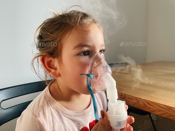 Preschool girl child with nebulizer Stock Photo by troyanpx | PhotoDune