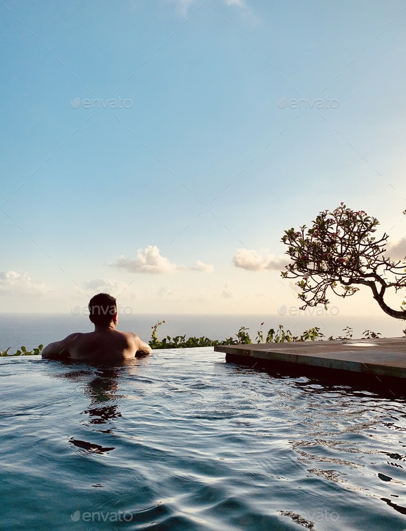 Chilling out in the infinity pool in the villa at the Bvlgari Resort ...