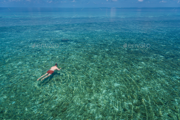 Take a dip and snorkel in the pristine turquoise blue waters in the ...