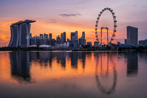 View of Singapore’s Marina Bay skyline at sunset. Stock Photo by Javanng