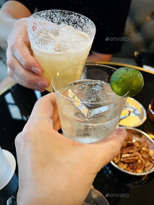 Having cocktails at the Writers Bar at Raffles Hotel Singapore. Stock ...