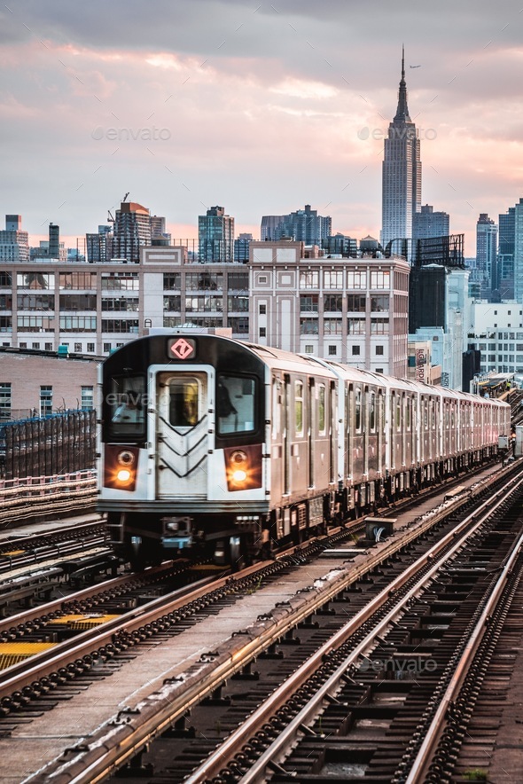 View of Empire State Building and the 7 train from Queens. Stock Photo ...