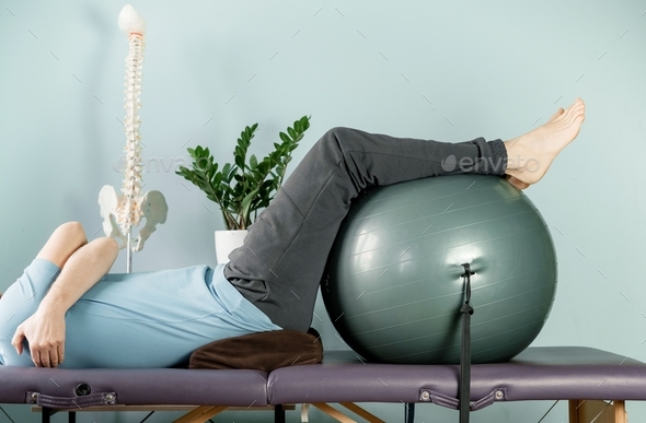 Rotation exercises on the fitness ball in constructive rest position ...