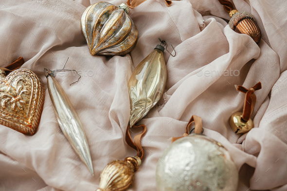 Stylish christmas vintage baubles on soft pastel cloth. Merry Christmas ...