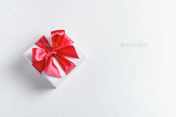 White present box on white background. Stock Photo by yulyatrikashnaya