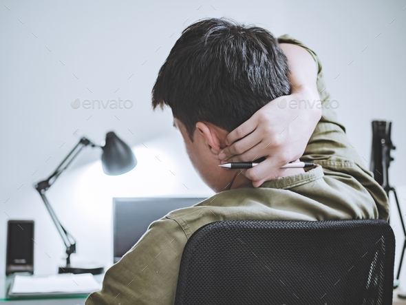 Concept of pain relief from work office syndrome Stock Photo by Kenstocker