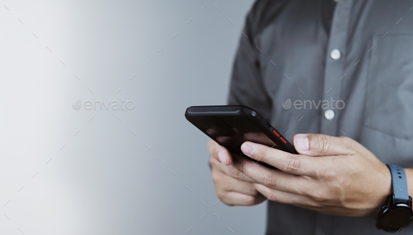 people use smartphone close up with grey background Stock Photo by ...