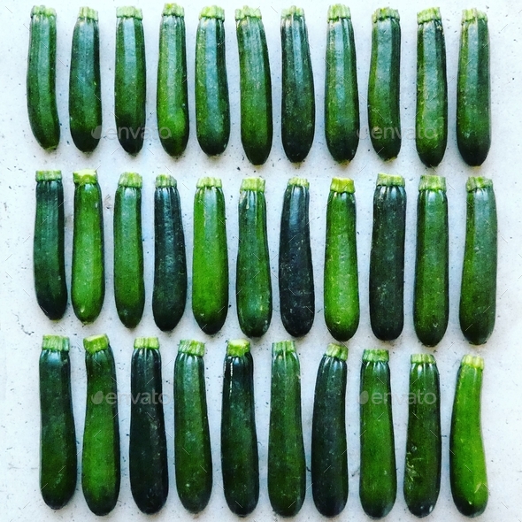 green courgette zucchini ,full frame food flat lay arranged neatly on ...