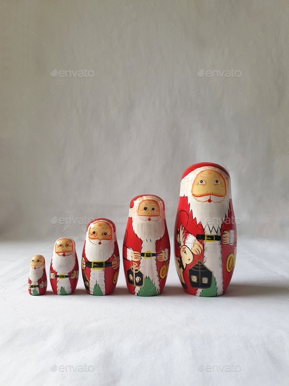 Santa Claus nesting dolls, Christmas decoration on white background ...