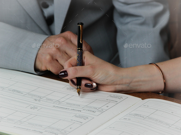 Signing the Register Stock Photo by bclare2 | PhotoDune