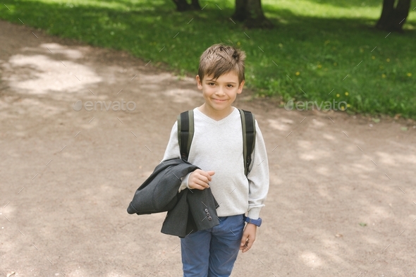 Back to school, happy boy with a backpack Stock Photo by svetlanas13