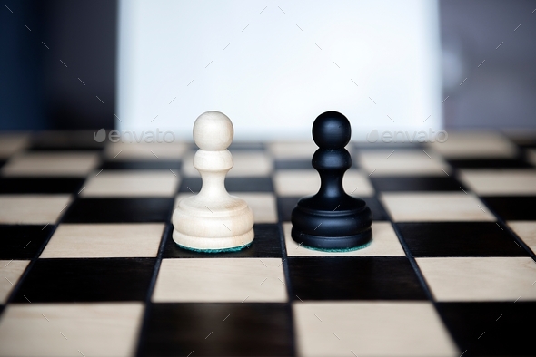 Chess pieces-two equally powerful adversaries facing each other Stock ...