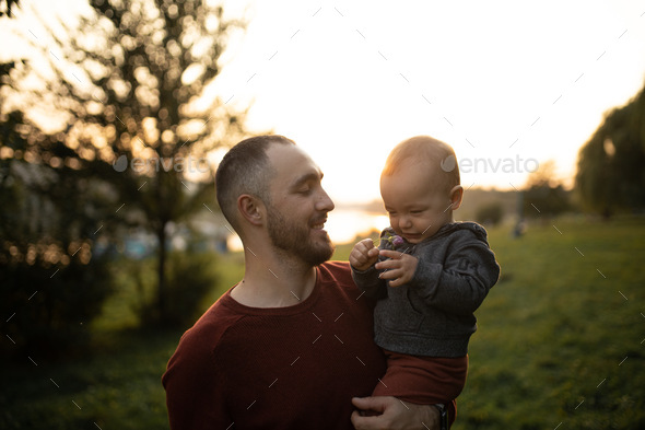 Father and his son meet the dawn. Fatherly love. The relationship ...