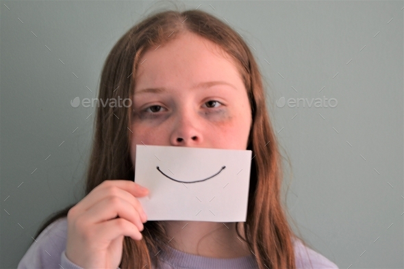 Smiling depression appearing happy to others while internally suffering ...