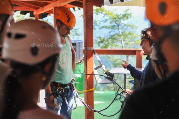 Instruction in the rope extreme park in the mountains in summer Stock ...