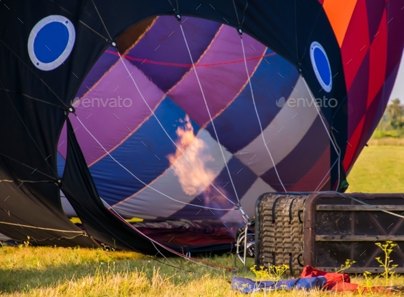 Preparing an aerostat balloon for flight in the summer in the field ...